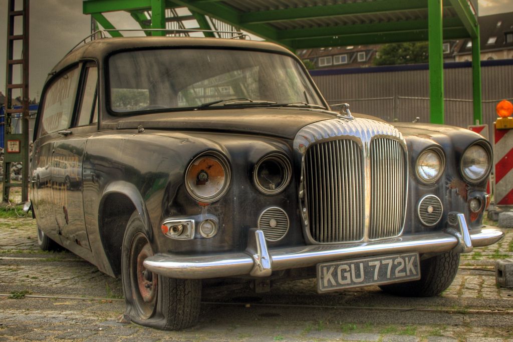 18 Spooky Pictures Of Deserted Hearses