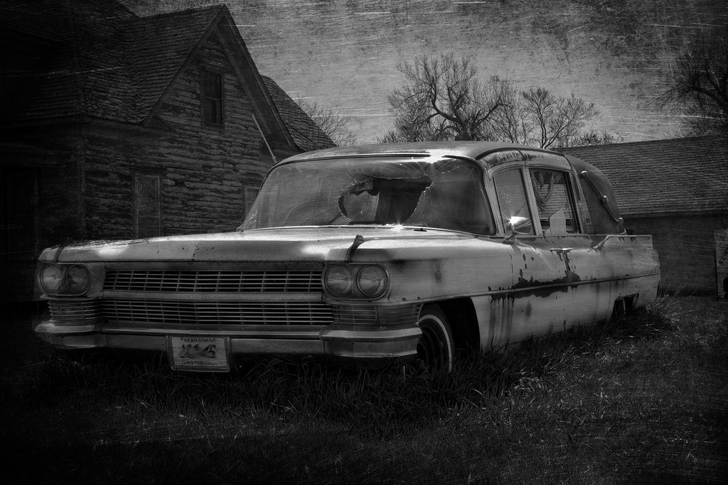 18 Spooky Pictures Of Deserted Hearses