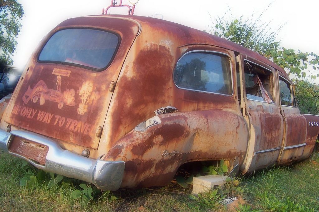 10 Haunting Pics Of Abandoned Hearses