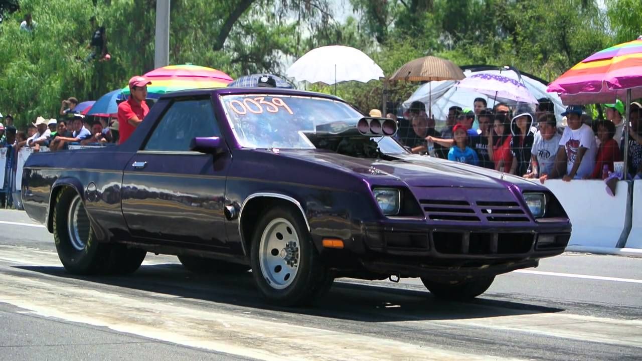 15 Beast Photos Of Muscle Cars With Oversized Engines