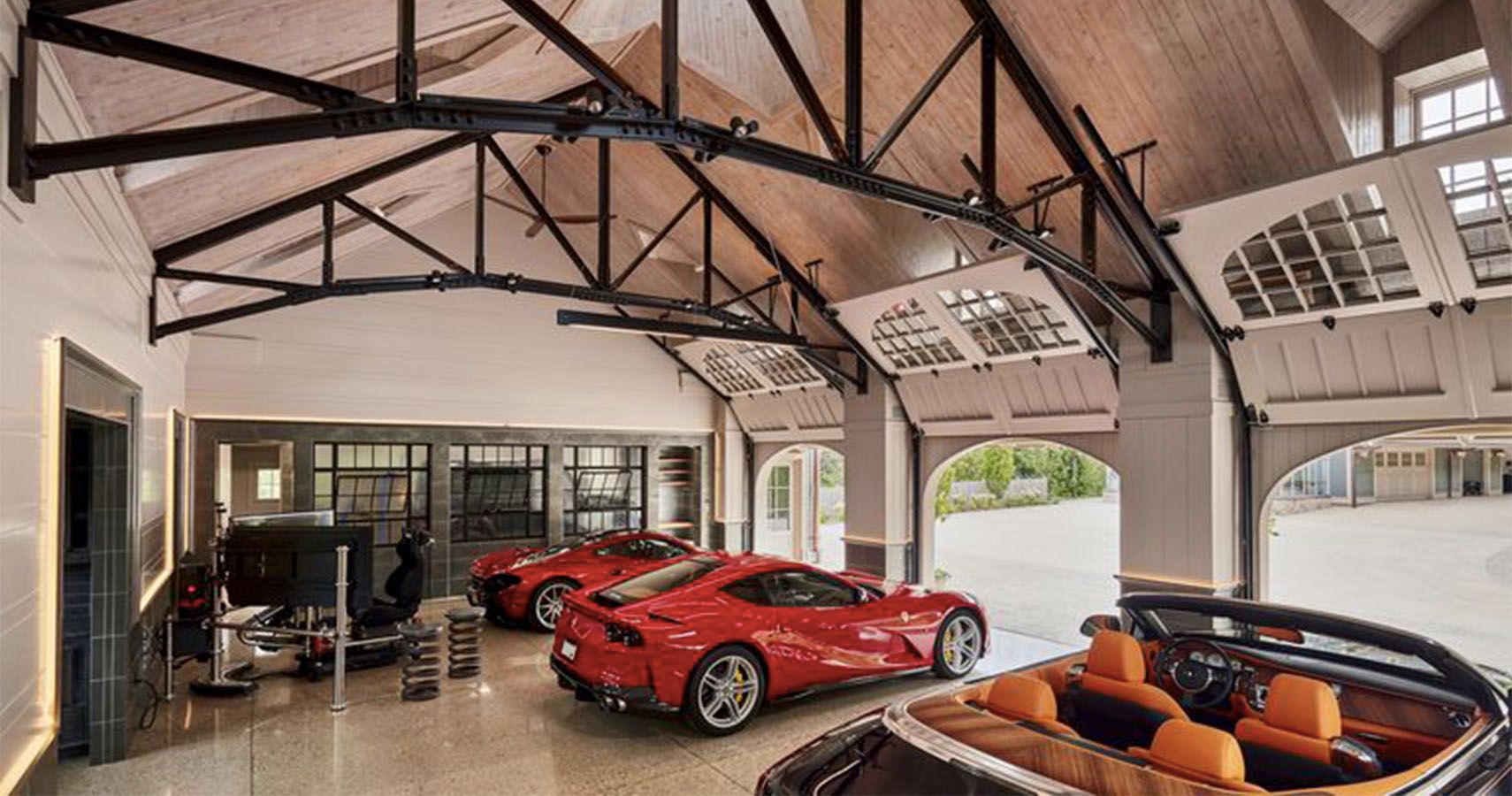 Check Out This Dream Garage With Ferraris AND A Built-In Bar
