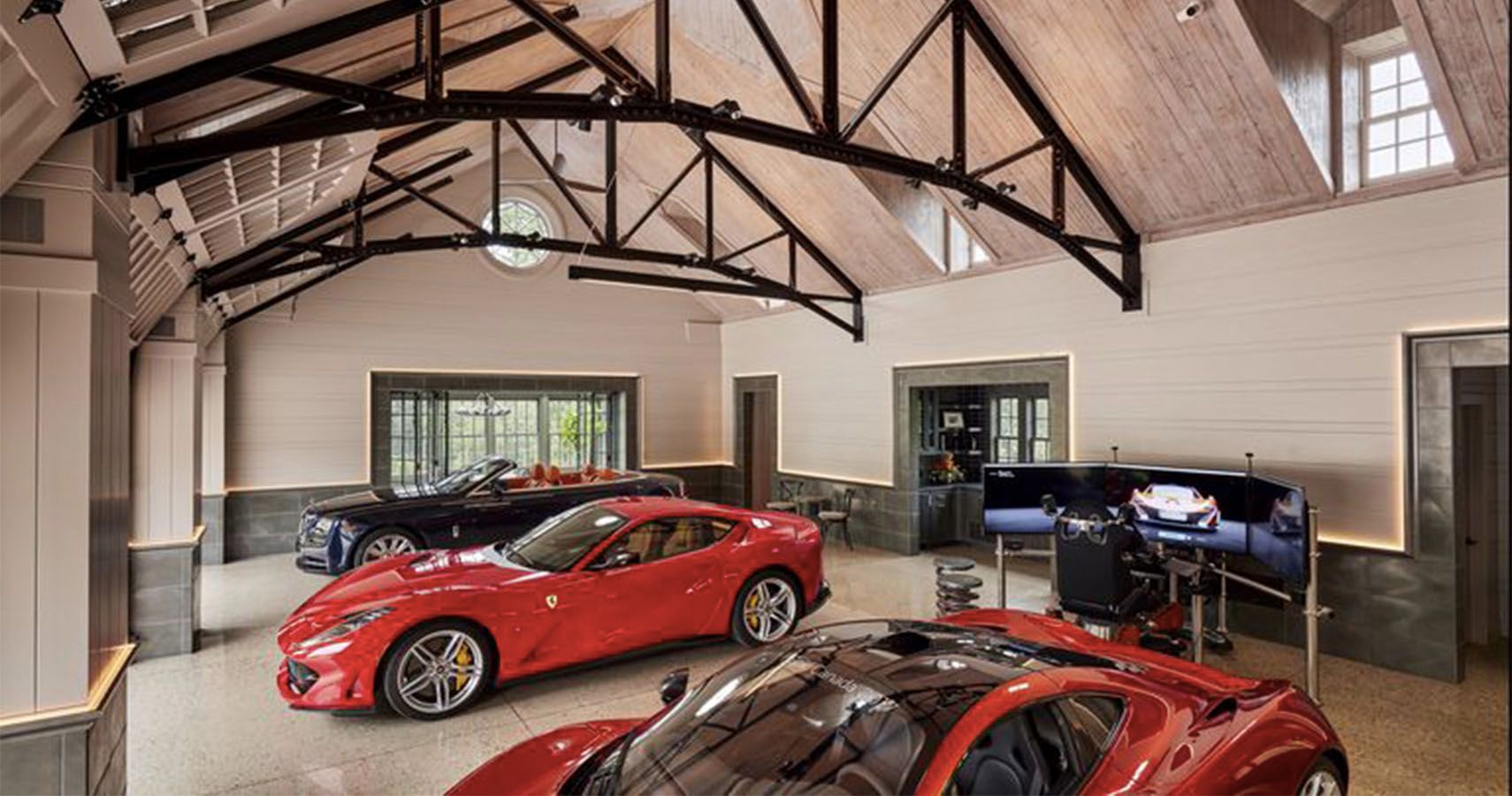 Check Out This Dream Garage With Ferraris AND A Built-In Bar