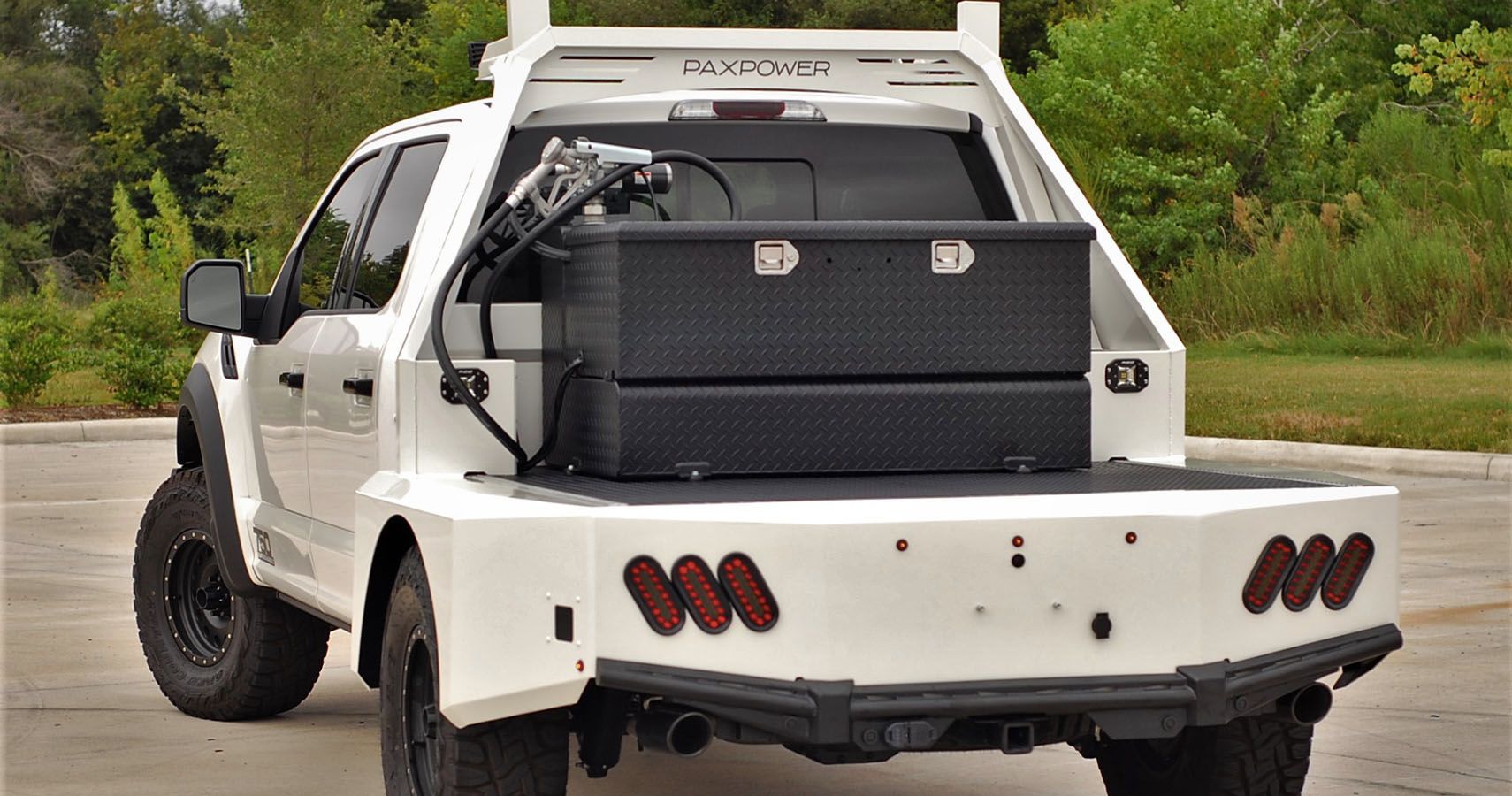 PaxPower Unveils Custom Flatbed Supercharged V8 Ford Raptor Conversion