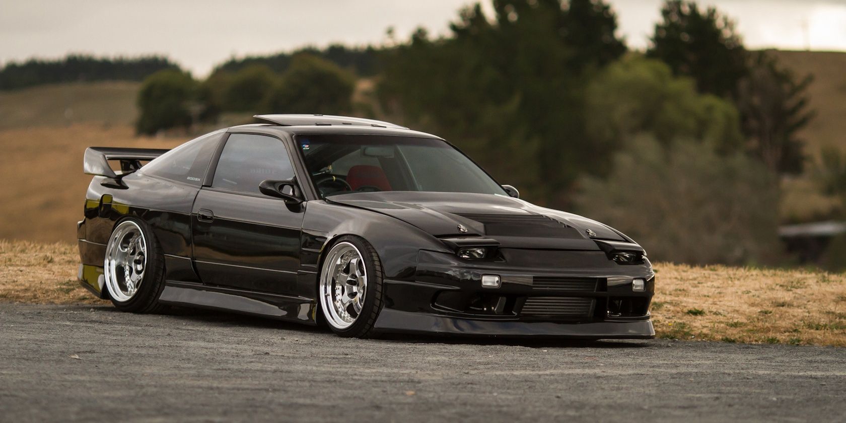 10 Iconic JDM Sports Cars Showing Off Their Coolest Bodykits