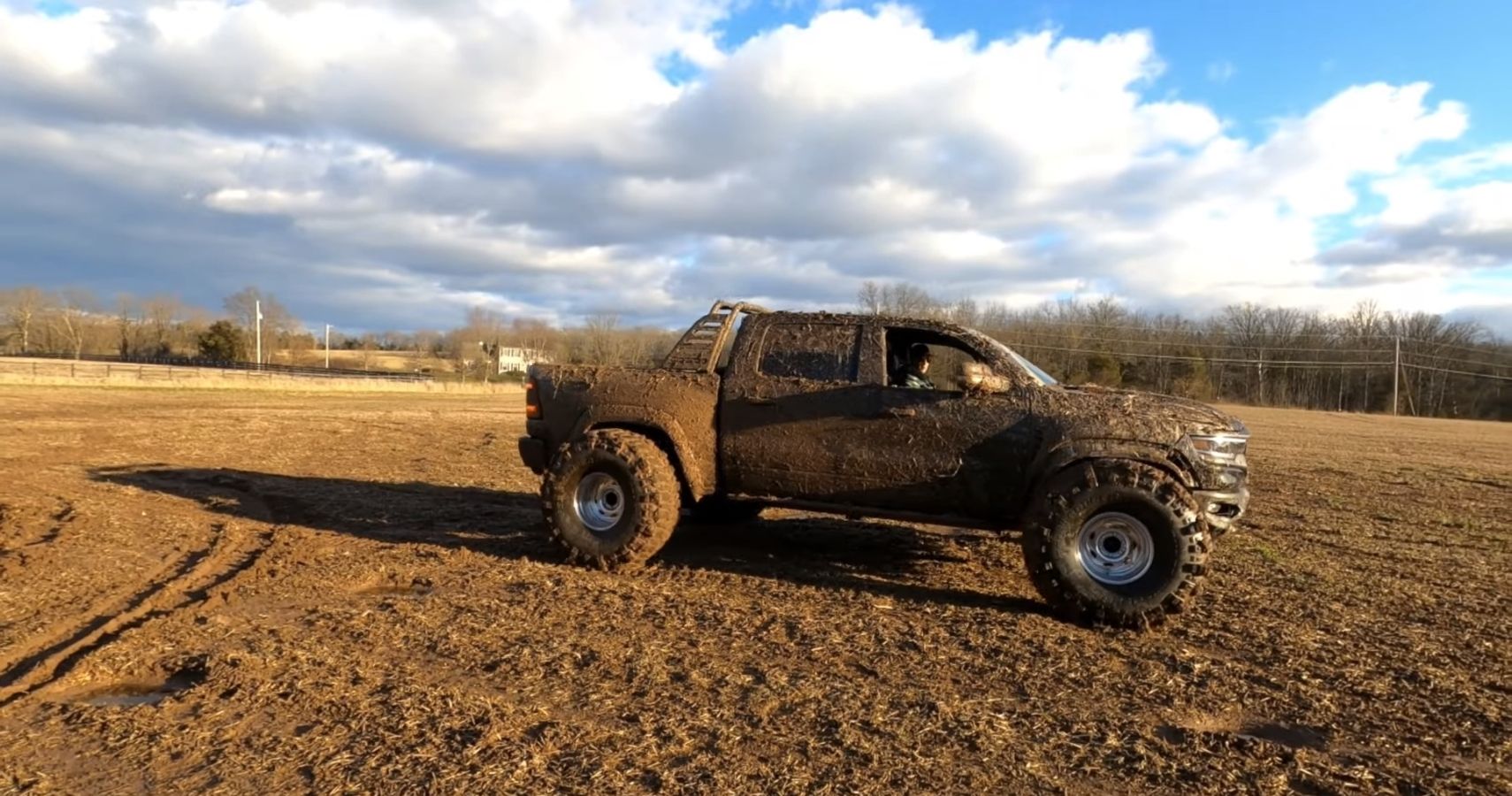YouTuber's 2021 Ram TRX Gets Dirty Riding On Massive Mud Boggers