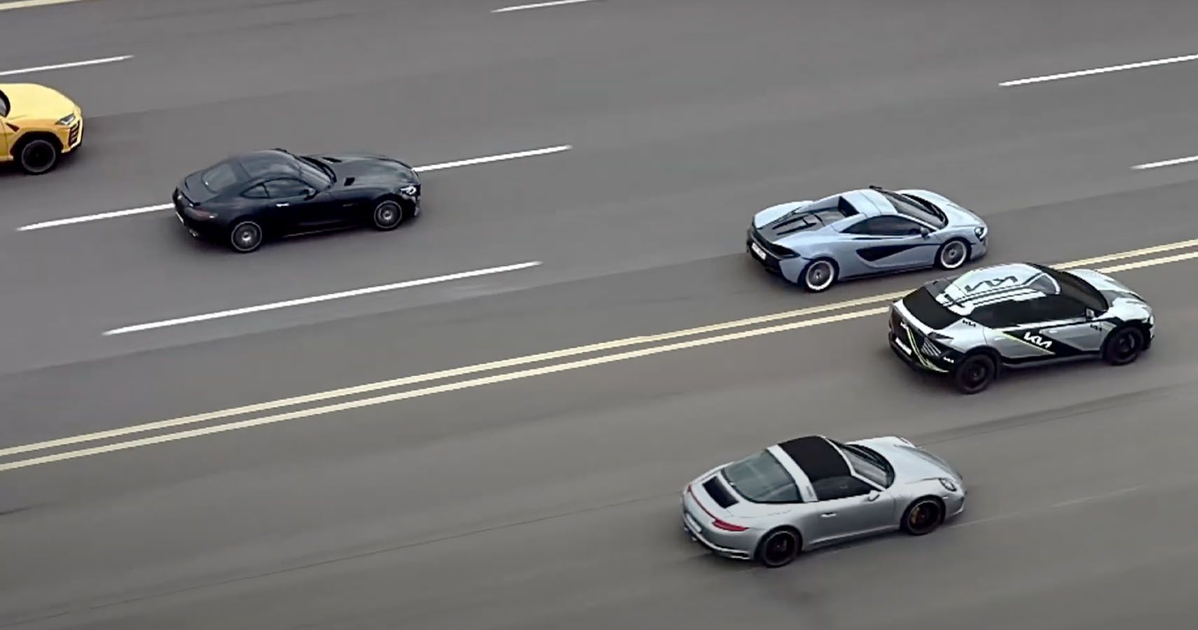 Watch The New Kia EV6 GT Drag Race A Lineup Of Six-Figure Supercars