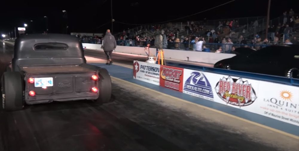 Watch This Blown Rat Rod Drag Race A Nitrous Camaro