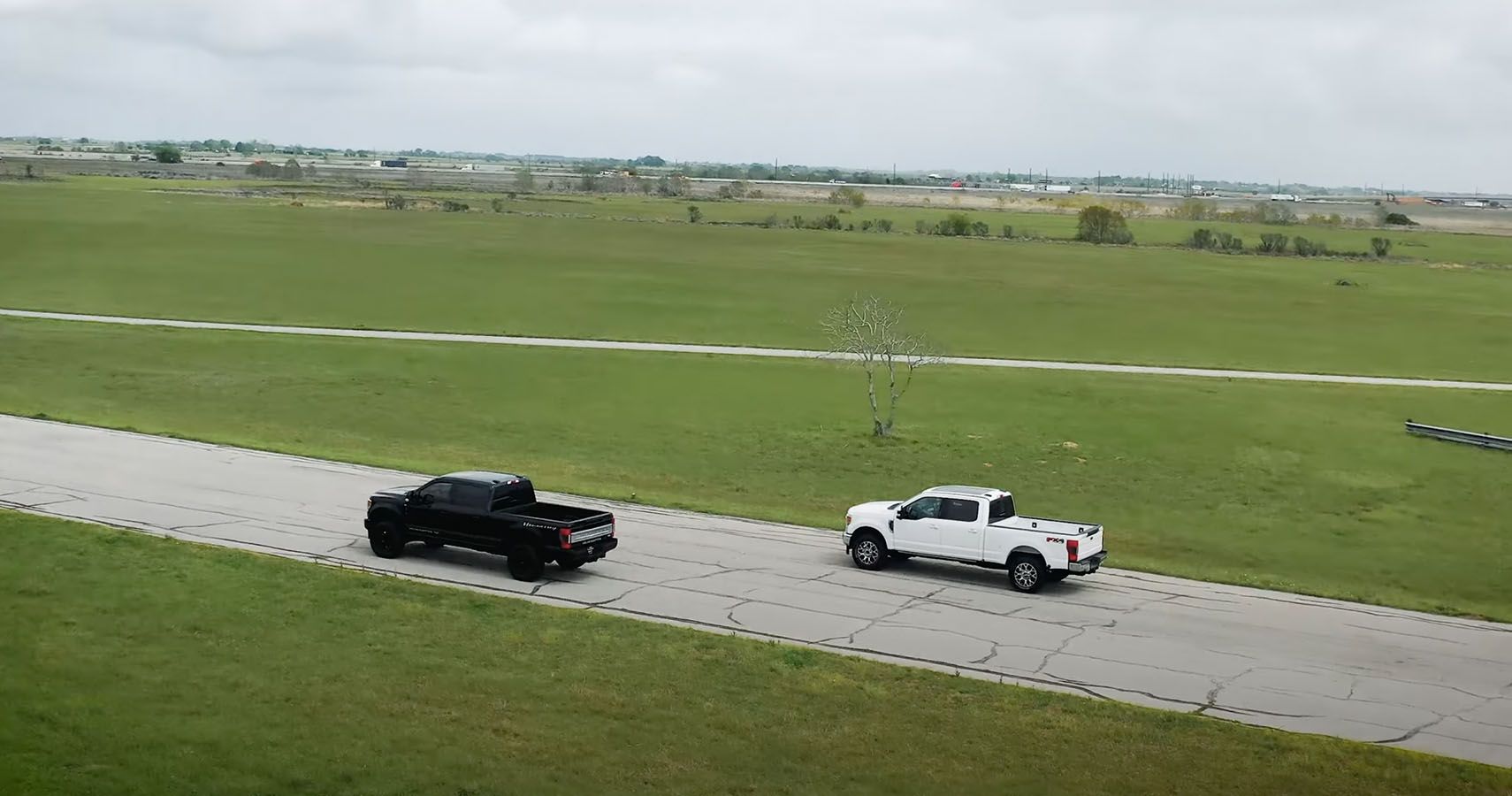 Watch Hennessey's Supercharged VelociRaptor Demolish A Stock F-250 Drag ...