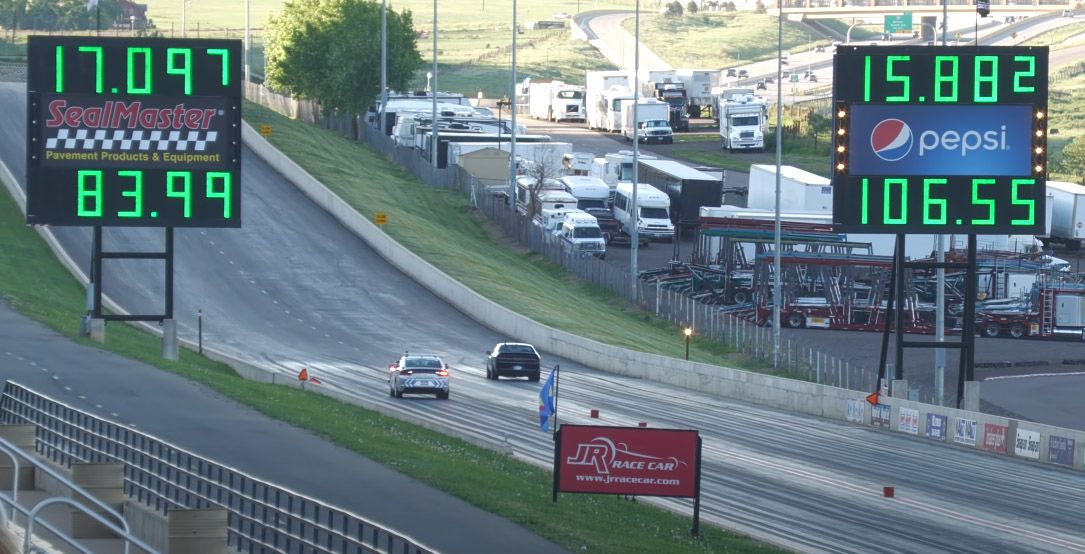 State Trooper Charger Drag Races Two Challenger Hellcats At Colorado ...
