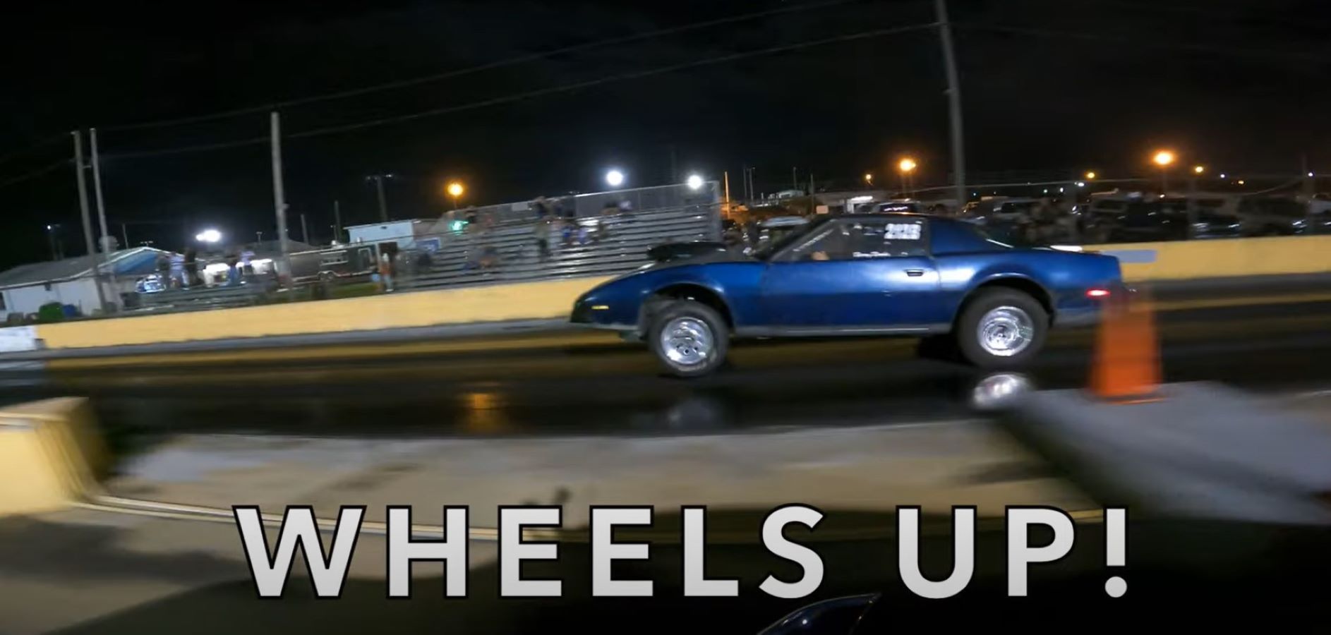 Watch This Wheelie-Popping Pontiac Firebird Drag Race A Tesla Model S Plaid