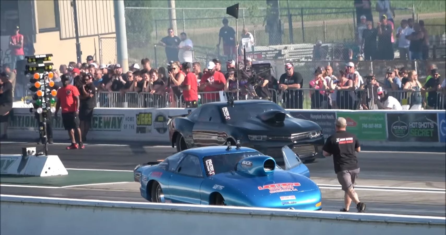 Watch This Ford Probe Almost Wipe Out A Chevrolet Camaro In Drag Race