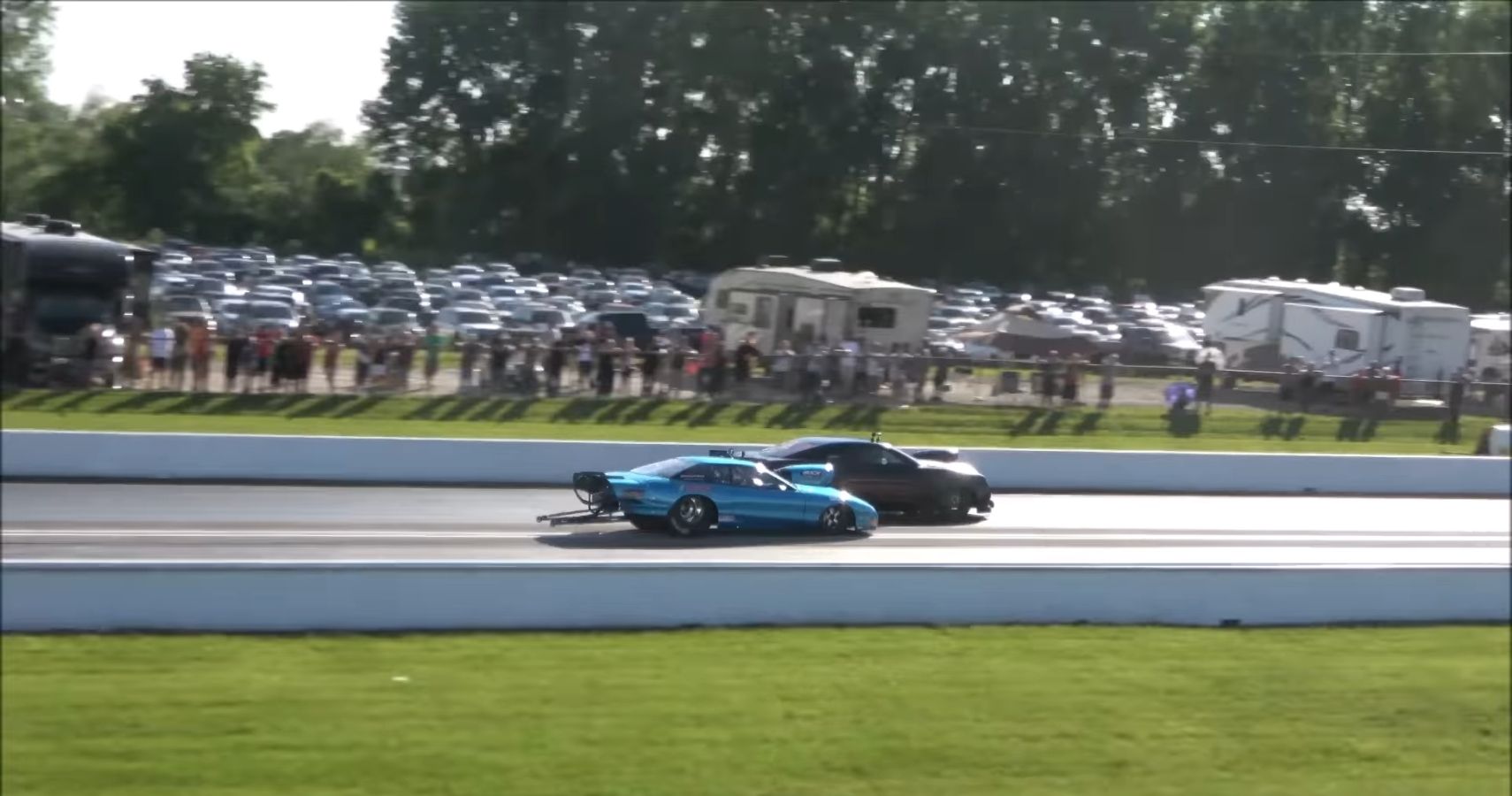 Watch This Ford Probe Almost Wipe Out A Chevrolet Camaro In Drag Race