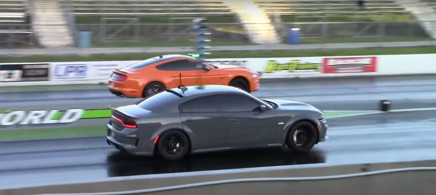Watch This Supercharged Dodge Charger SRT 392 Take Down An S550 Ford ...