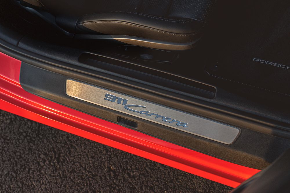 10 Reasons Why We'd Buy The Porsche 911 Carrera Over The Flagship Model