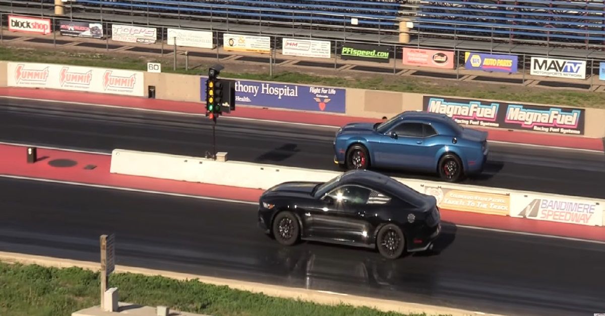 Watch A Ford Mustang GT Get Smoked By A Hellcat Redeye