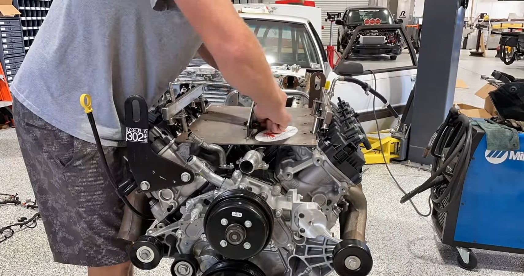 Watch Why Shoehorning A 7.3L Godzilla V8 Into A Ford Mustang Fox Body ...