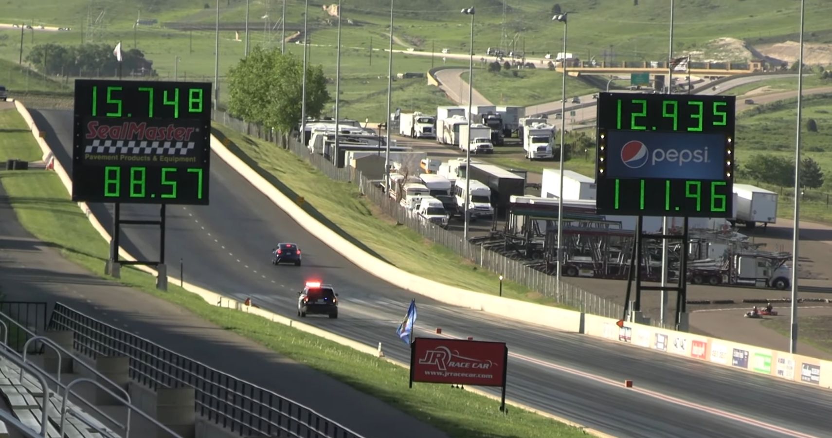 Watch If A Tesla Model Y Out Drag A Police Interceptor In A Quarter-Mile