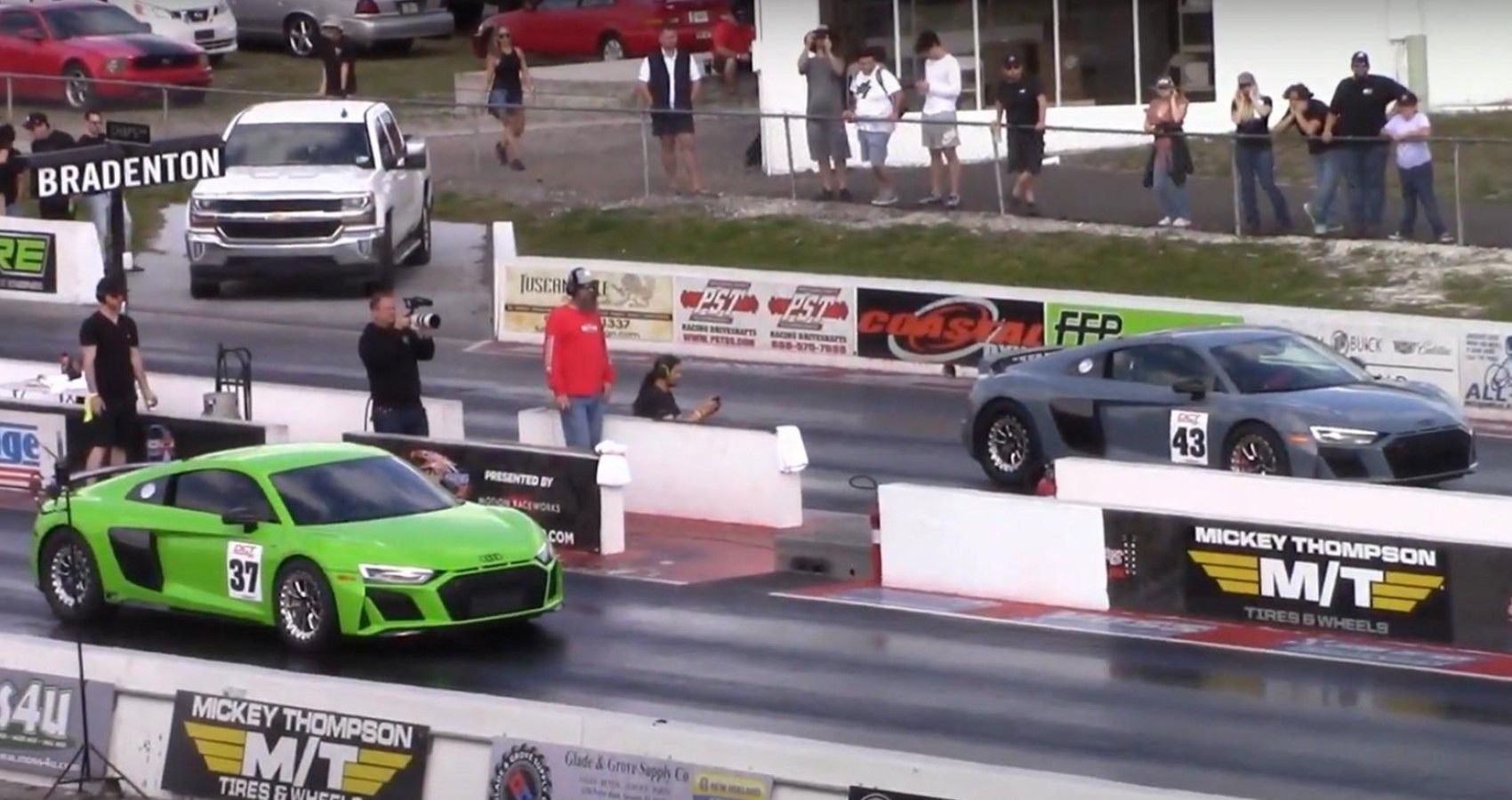 These Audi R8s Show A Nissan R35 GT-R How To Pop A Proper Wheelie